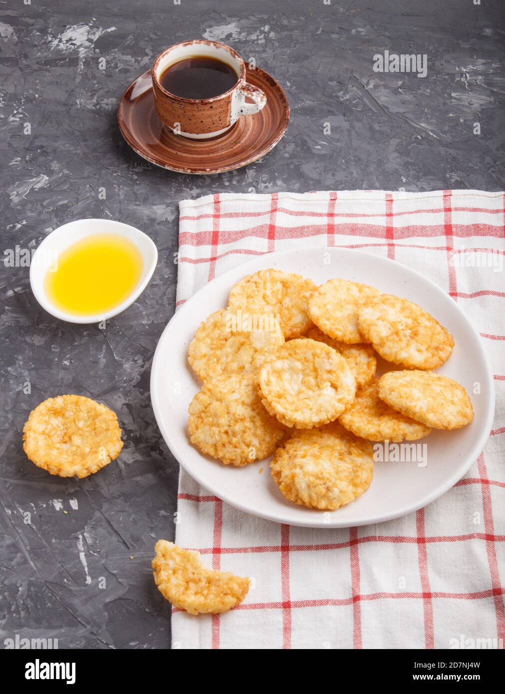 Traditional japanese rice chips cookies with honey and soy sauce on a ...