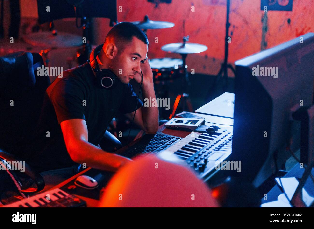 Sound engineer working and mixing music indoors in the studio Stock ...
