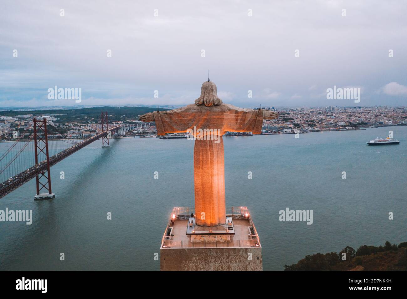 Aerial shot of Cristo Rei Christ Statue in Lisbon overlooking the city ...