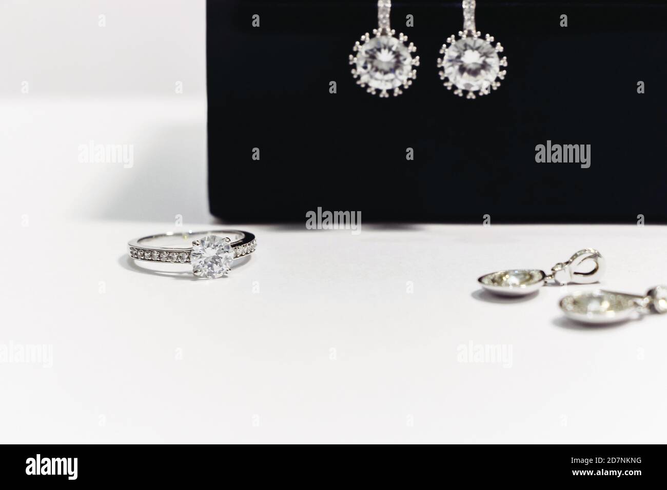 elegant diamond jewelry set on white background Stock Photo - Alamy