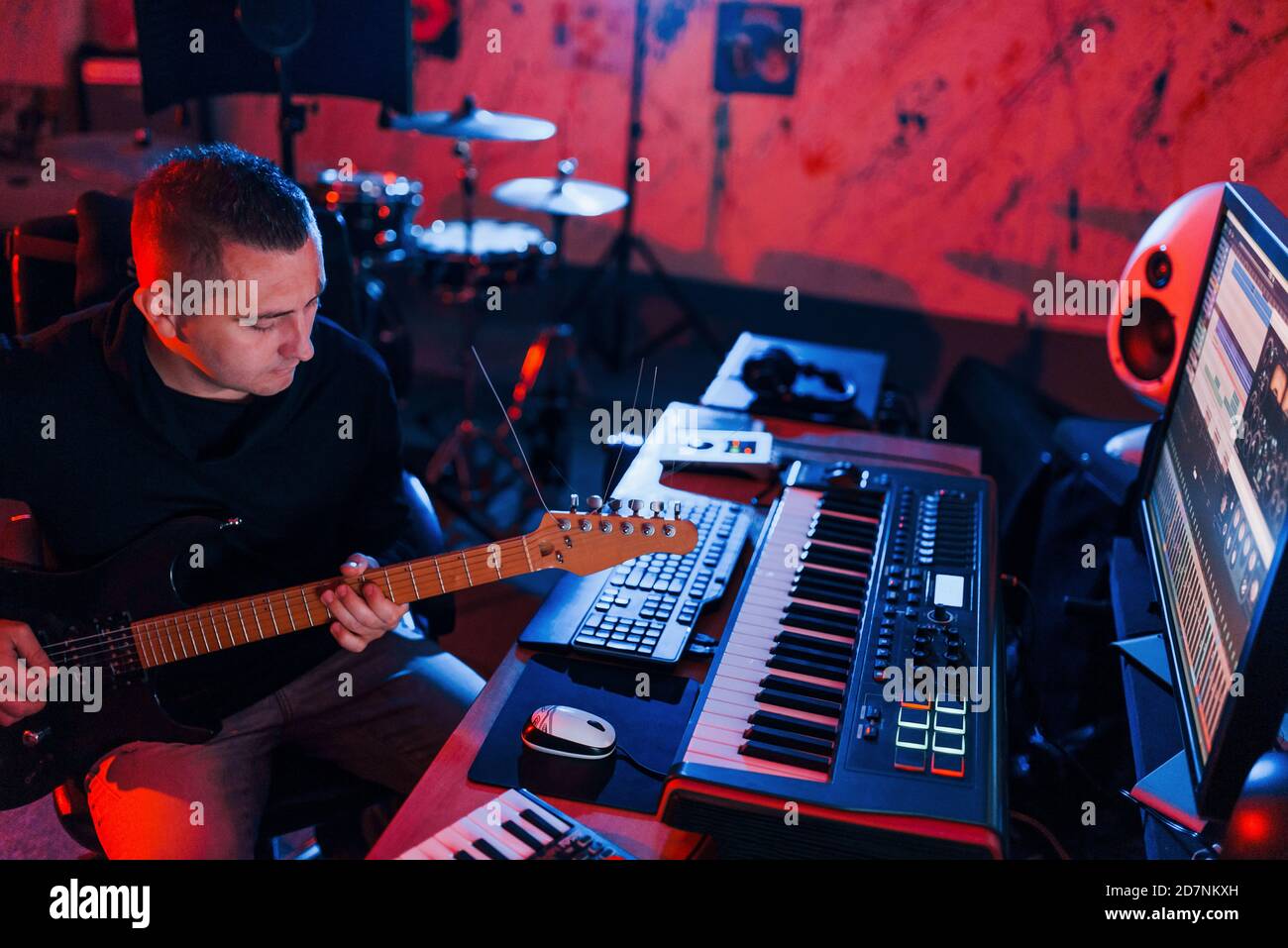 Guitar player have recording session indoors in the studio Stock Photo ...