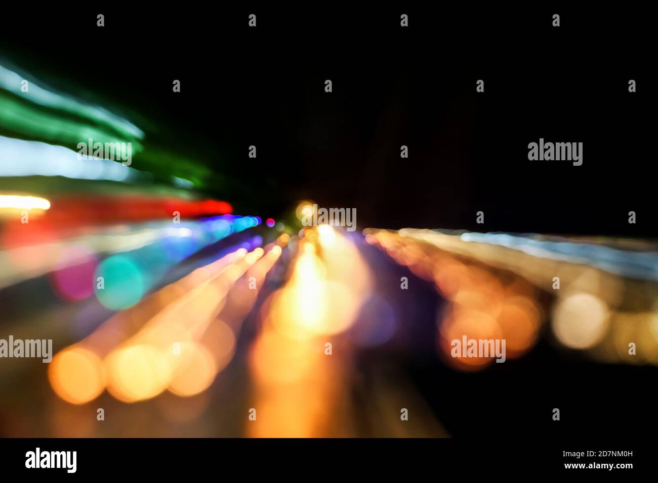 colorful abstract lights with lens zoom effect in darkness Stock Photo ...