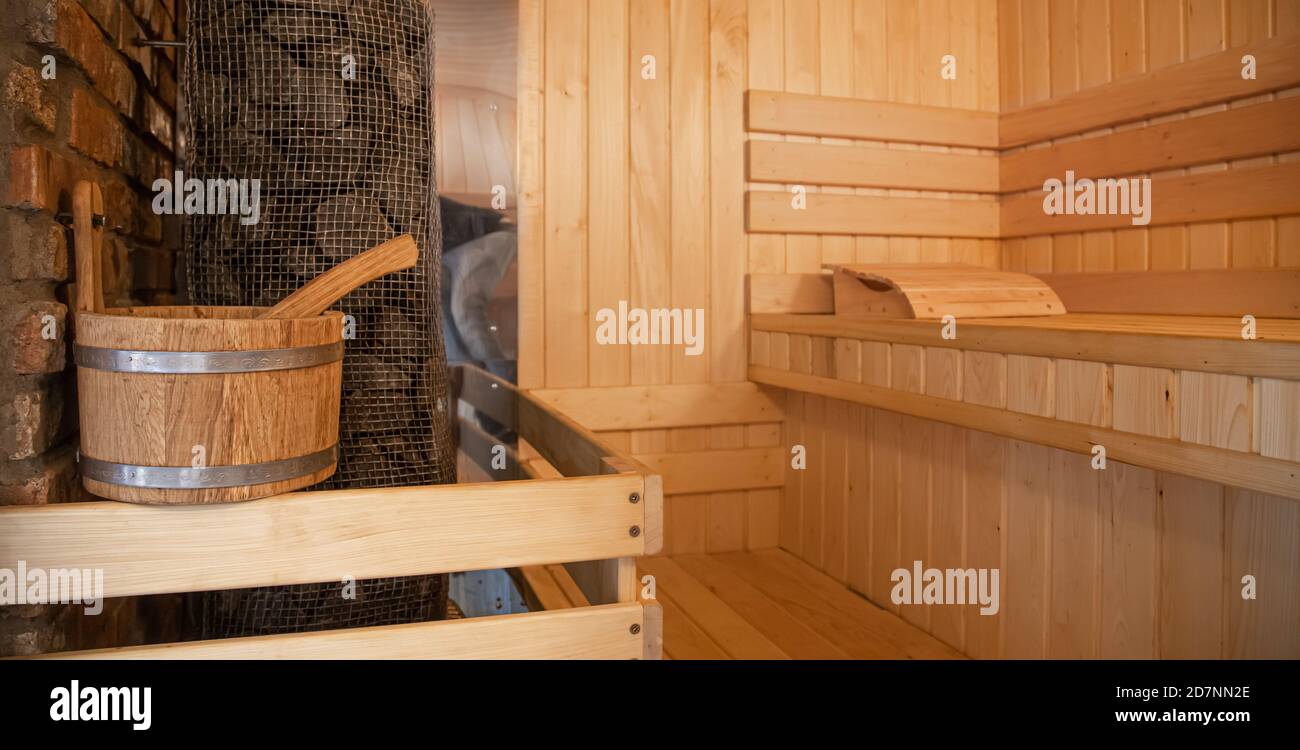 Interior of a wooden Russian bath with traditional items for use ...