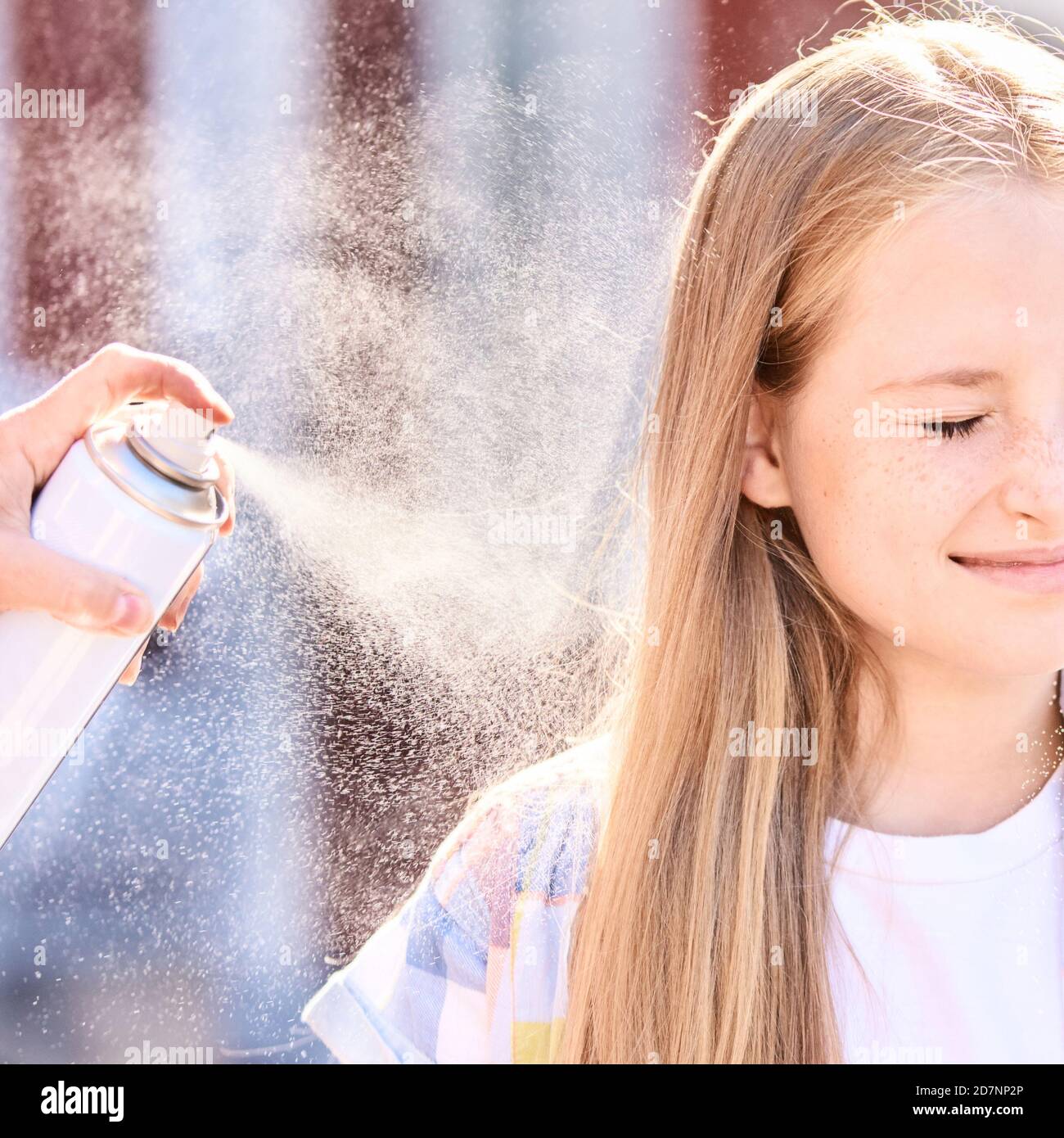 Female hairdresser using hair spray hi-res stock photography and images ...