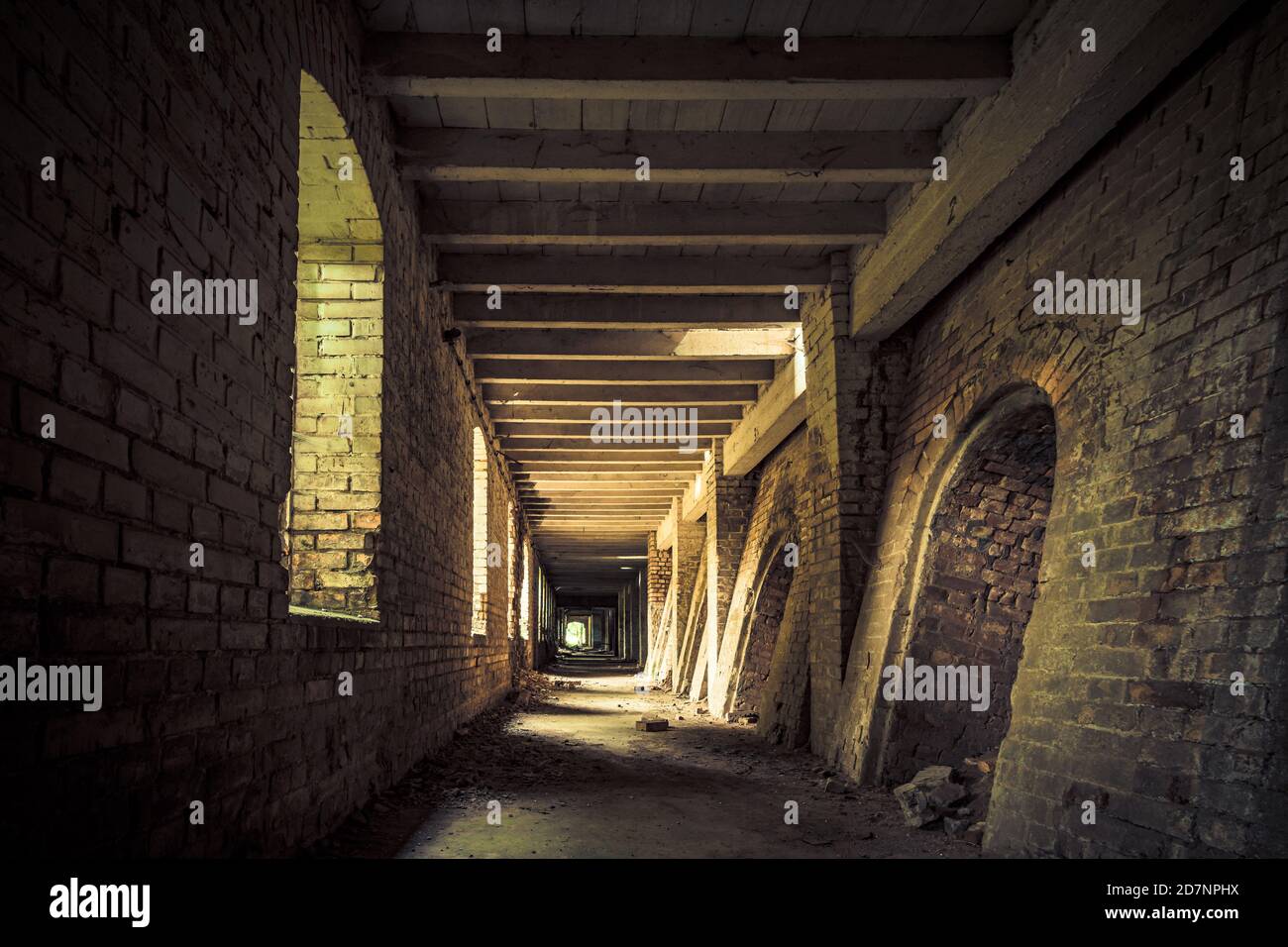 Urban exploring in an old abandoned brick factory, a lost place with ...