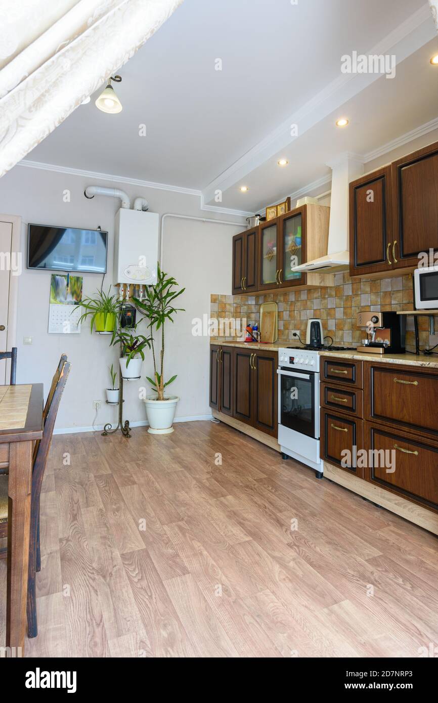 Kitchen set in a standard apartment in a classic style Stock Photo - Alamy