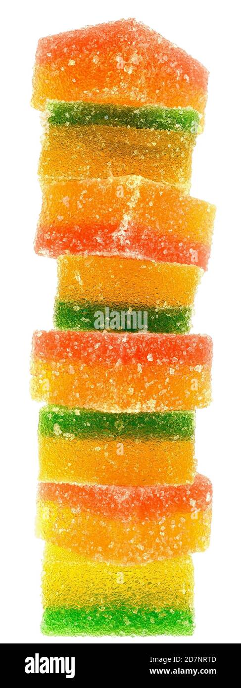 Tower multicolored candy on a white background Stock Photo - Alamy