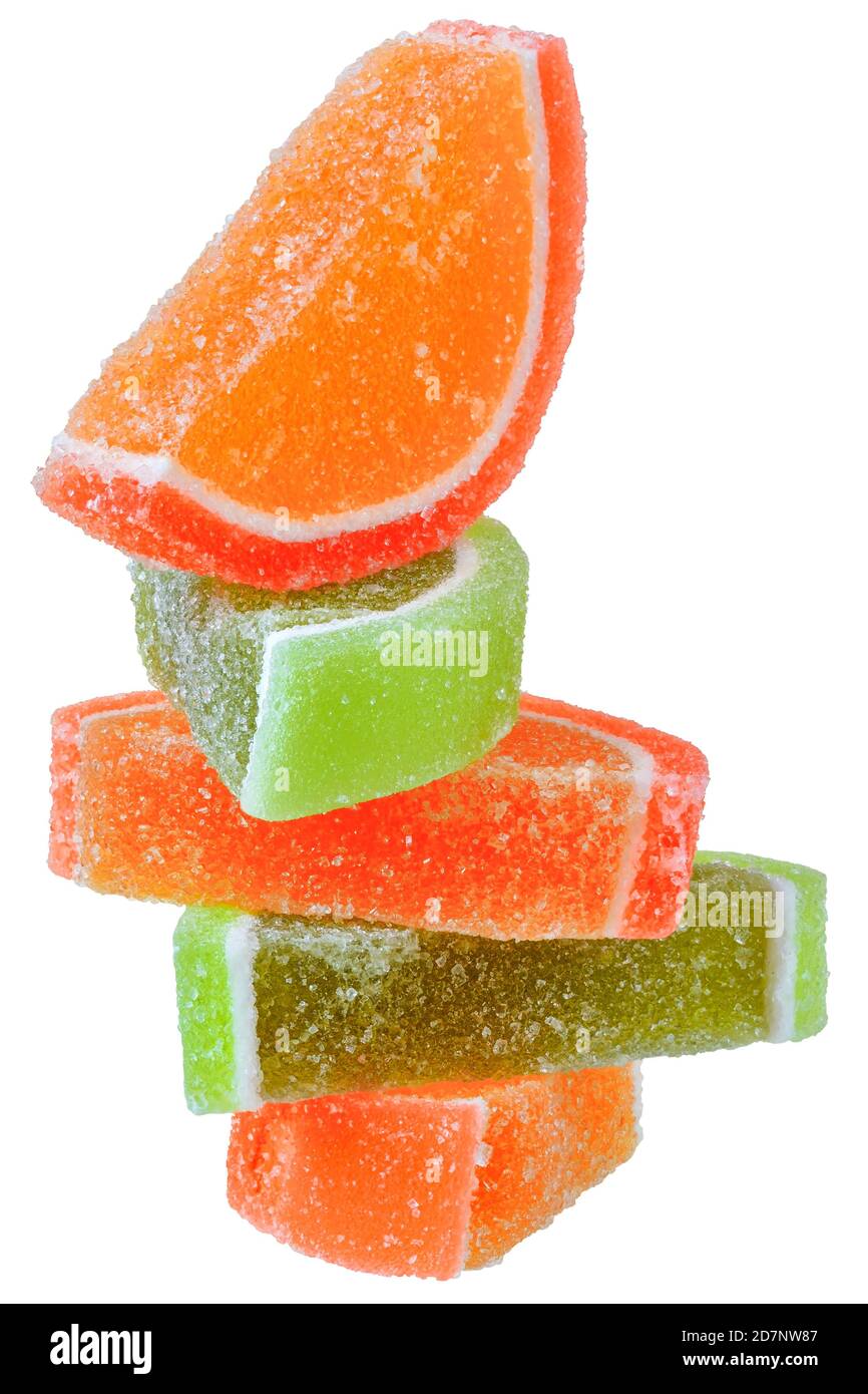 Multicolored candy tower on white background Stock Photo - Alamy