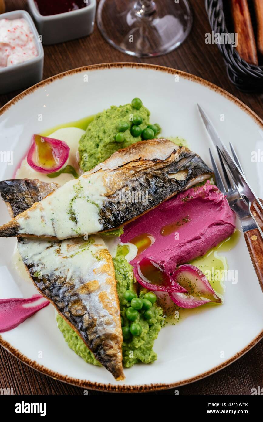 grilled fish fillet with vegetable mousse Stock Photo - Alamy