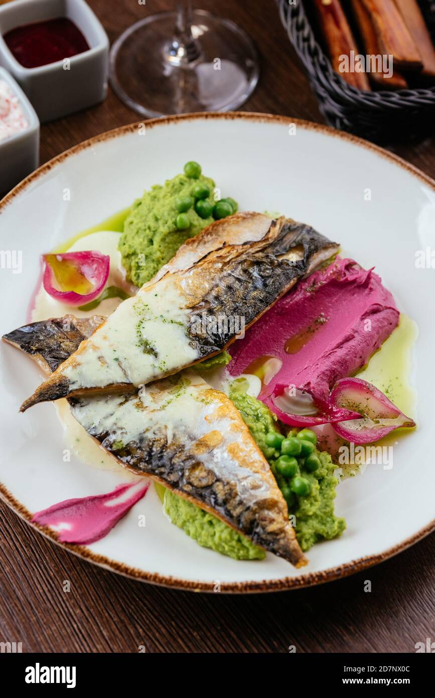 grilled fish fillet with vegetable mousse Stock Photo - Alamy