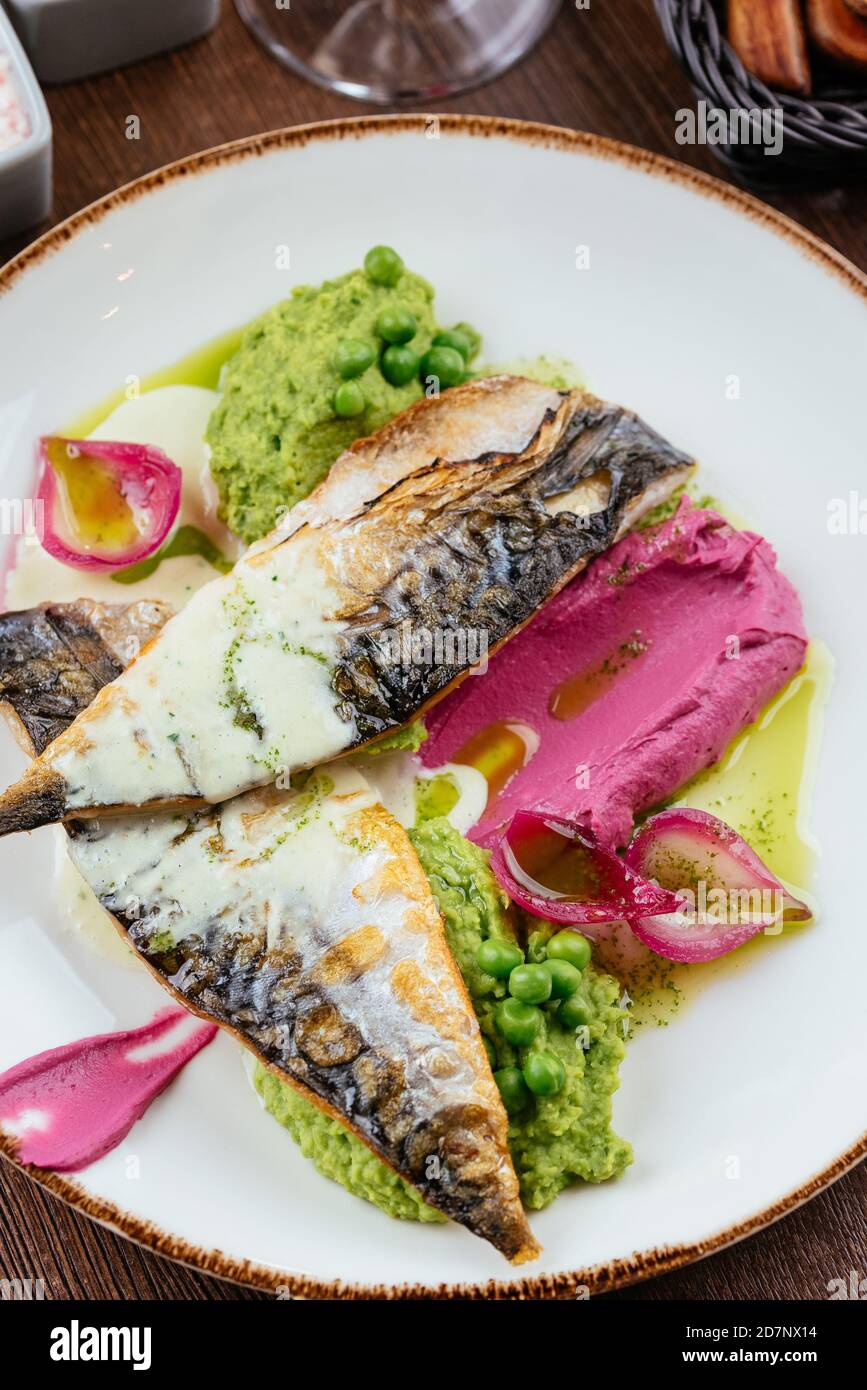 grilled fish fillet with vegetable mousse Stock Photo - Alamy