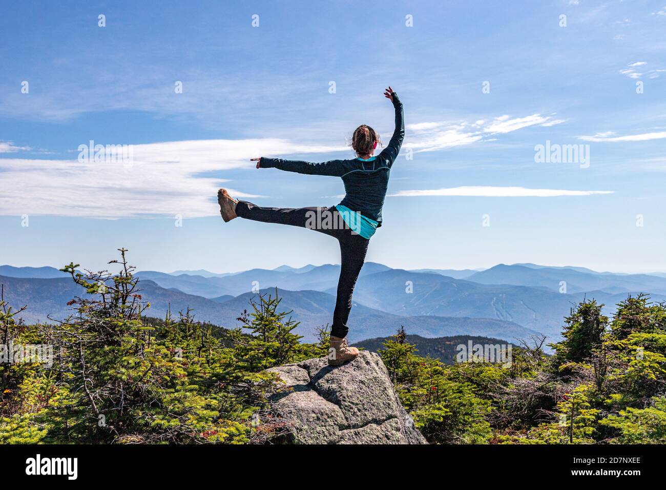 Woman balancing on one leg hi-res stock photography and images - Alamy