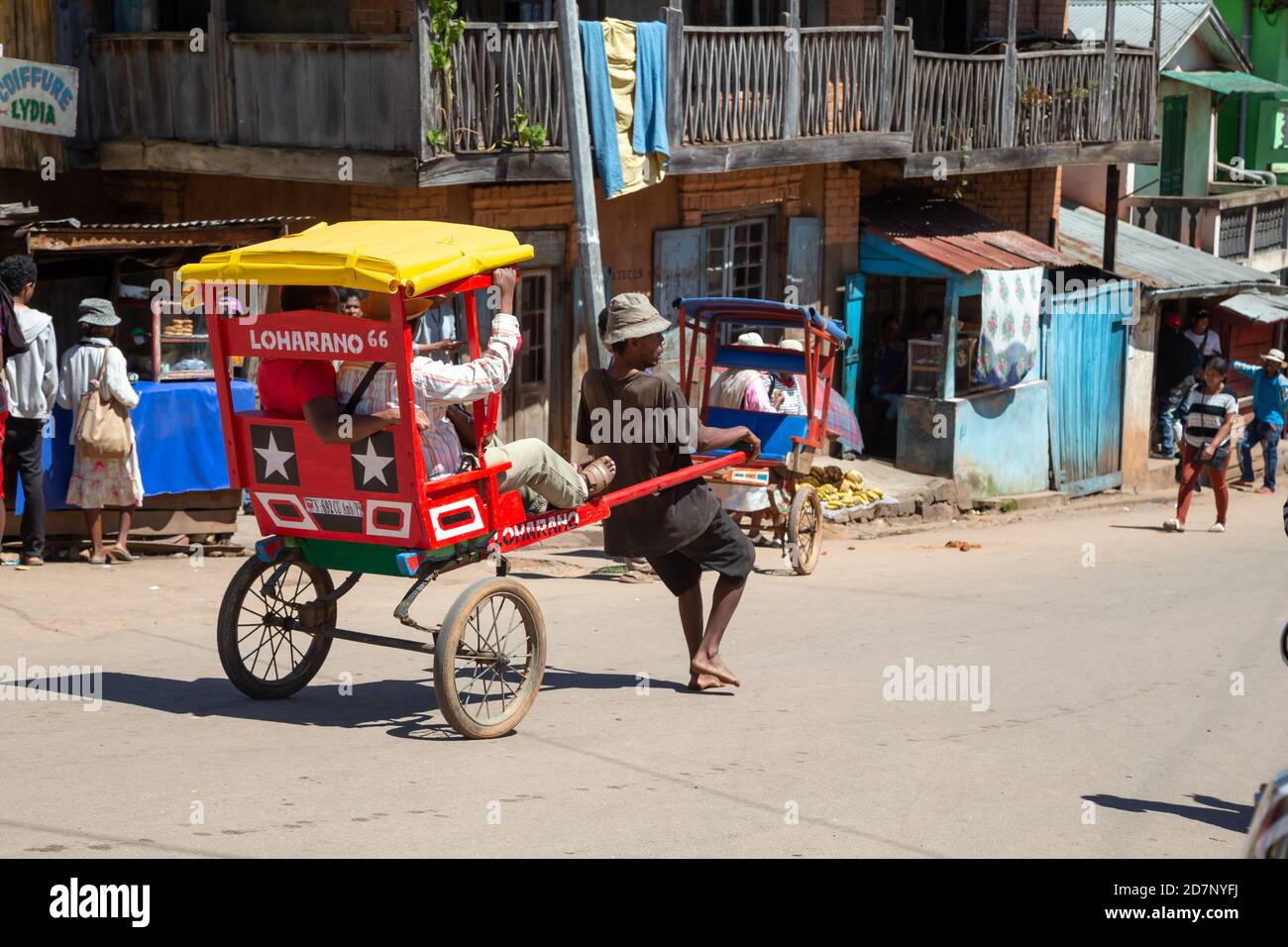 Editorial. A Rickshaw taxis in the streets of Madagascar Stock Photo ...