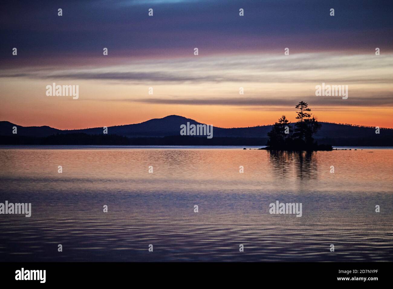 Sunrise on over mountains and islands of Millinocket Lake, Maine Stock ...