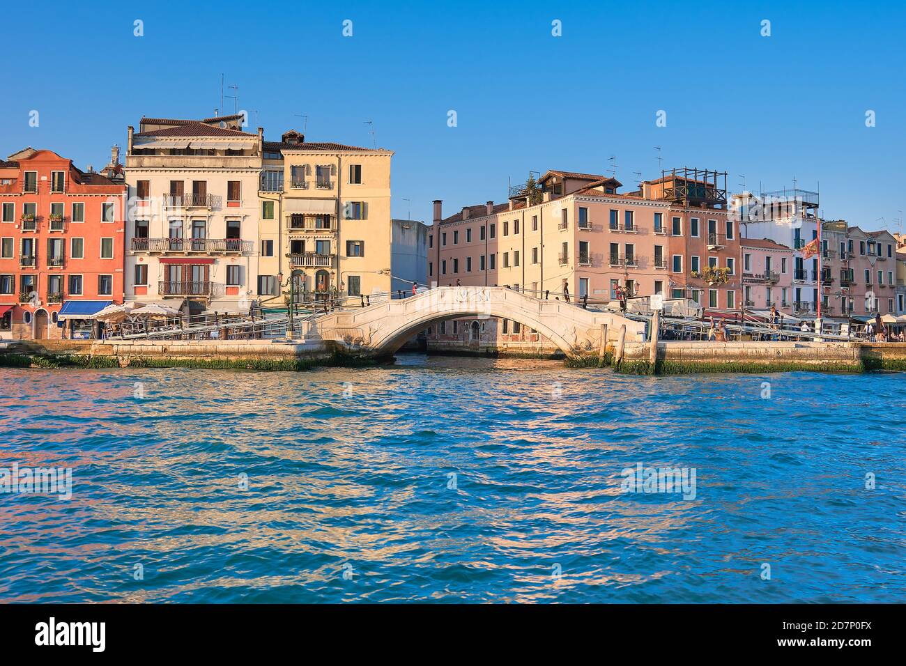 Romantic Venice. Traditional houses and pedestrian bridge in Venice ...