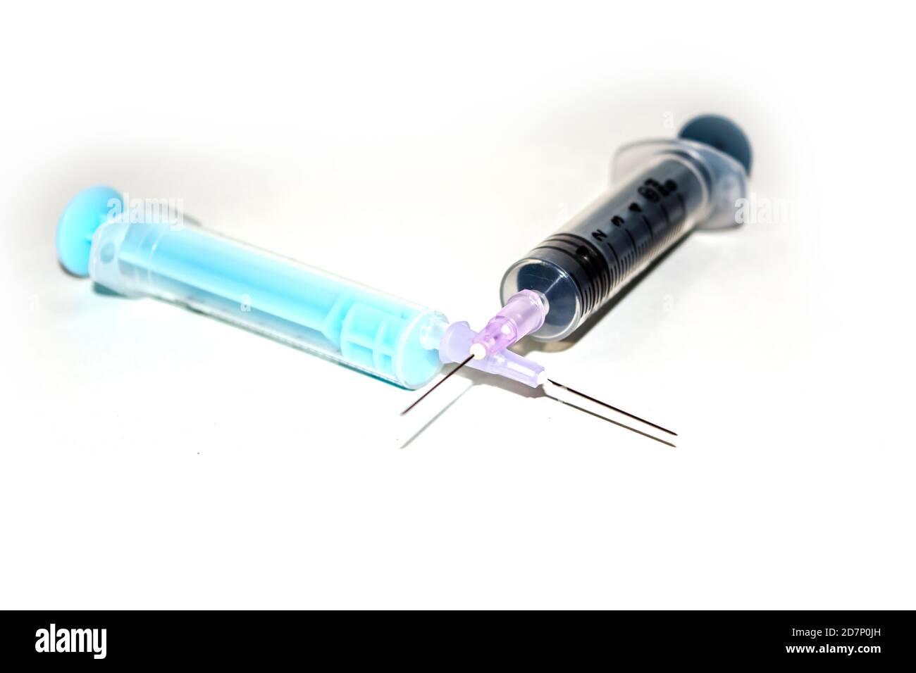 Medical syringe isolated on a white background Stock Photo - Alamy