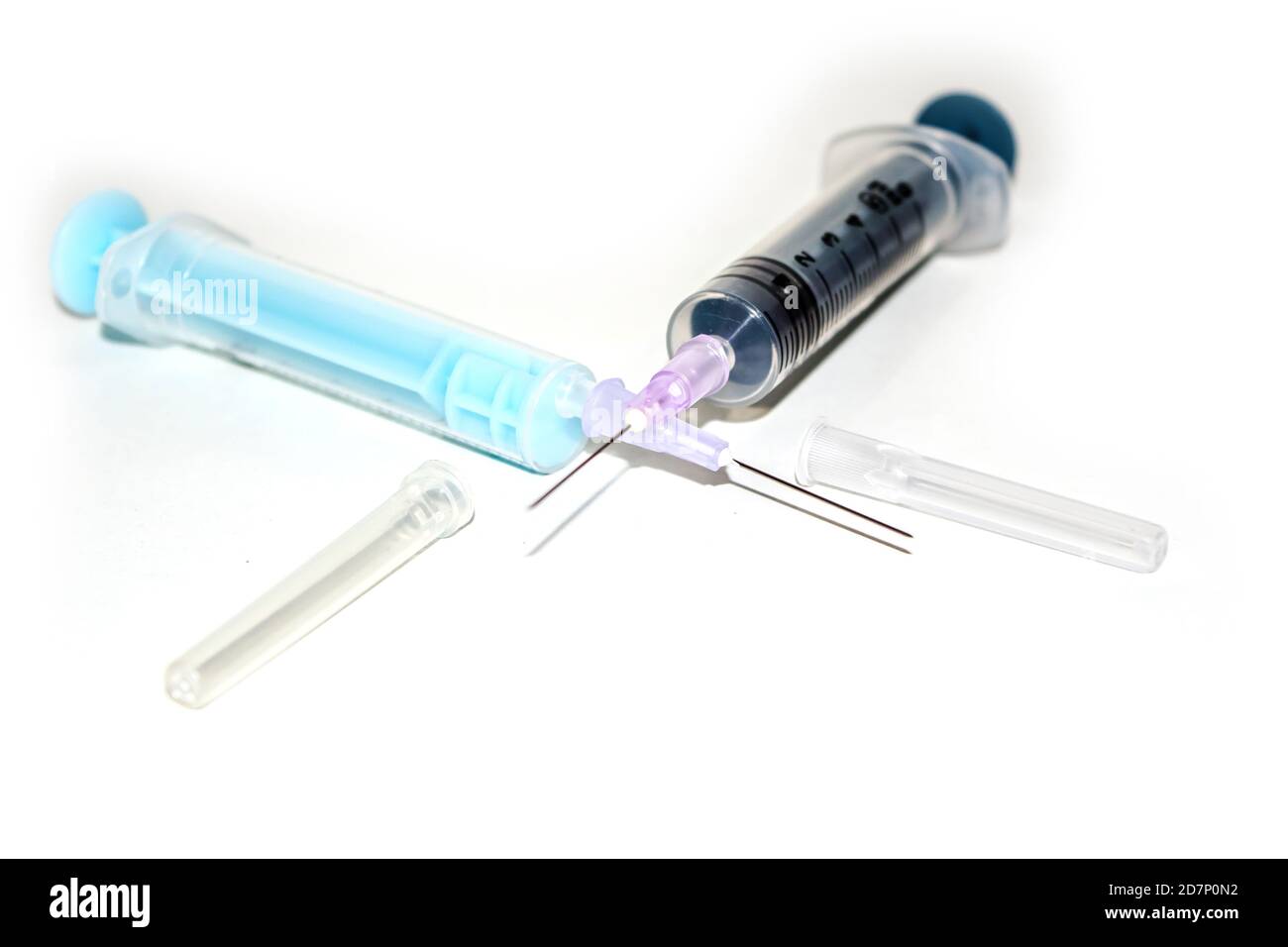 Medical syringe isolated on a white background Stock Photo - Alamy