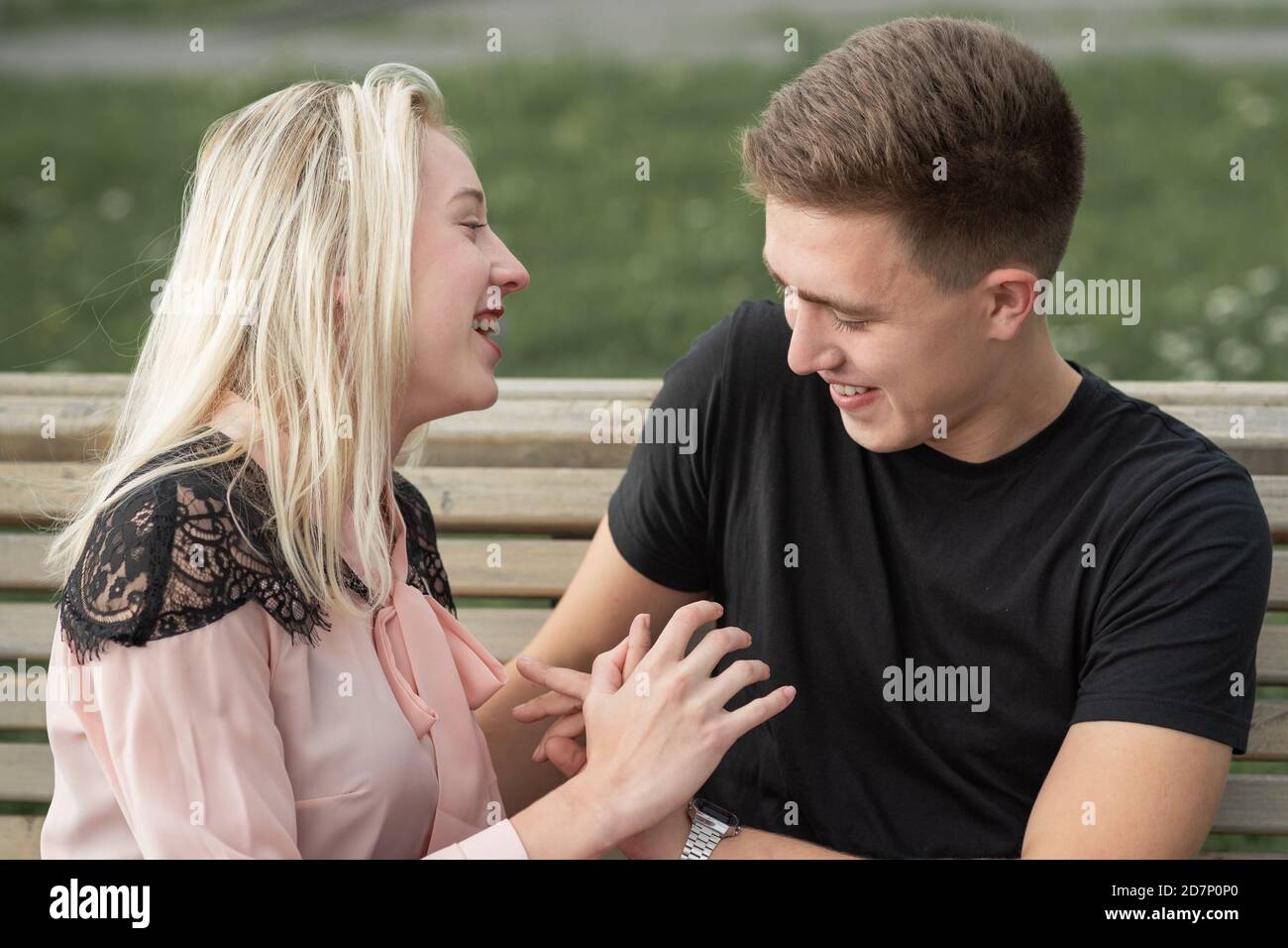 Happy couple in love looking at each other and having fun Stock Photo ...