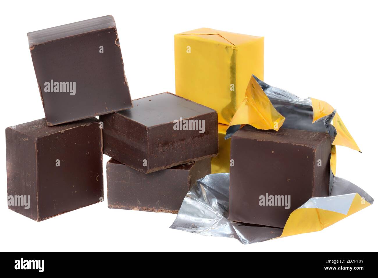 Cubes of chocolate in golden packing isolated on a white background ...