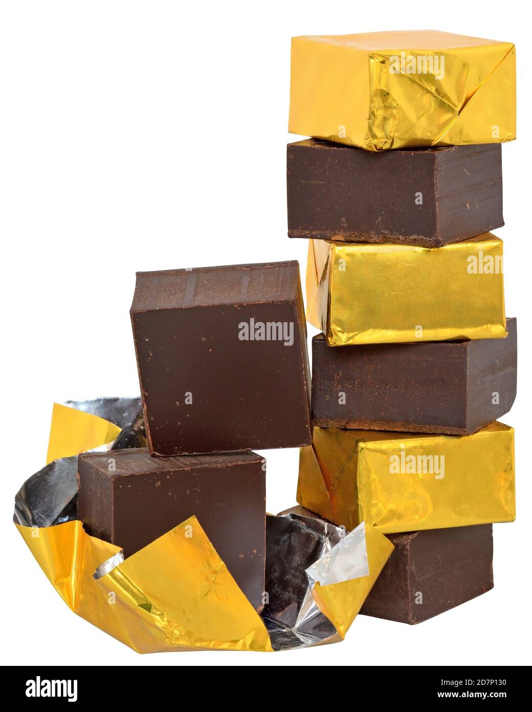 Cubes of chocolate in golden packing isolated on a white background ...