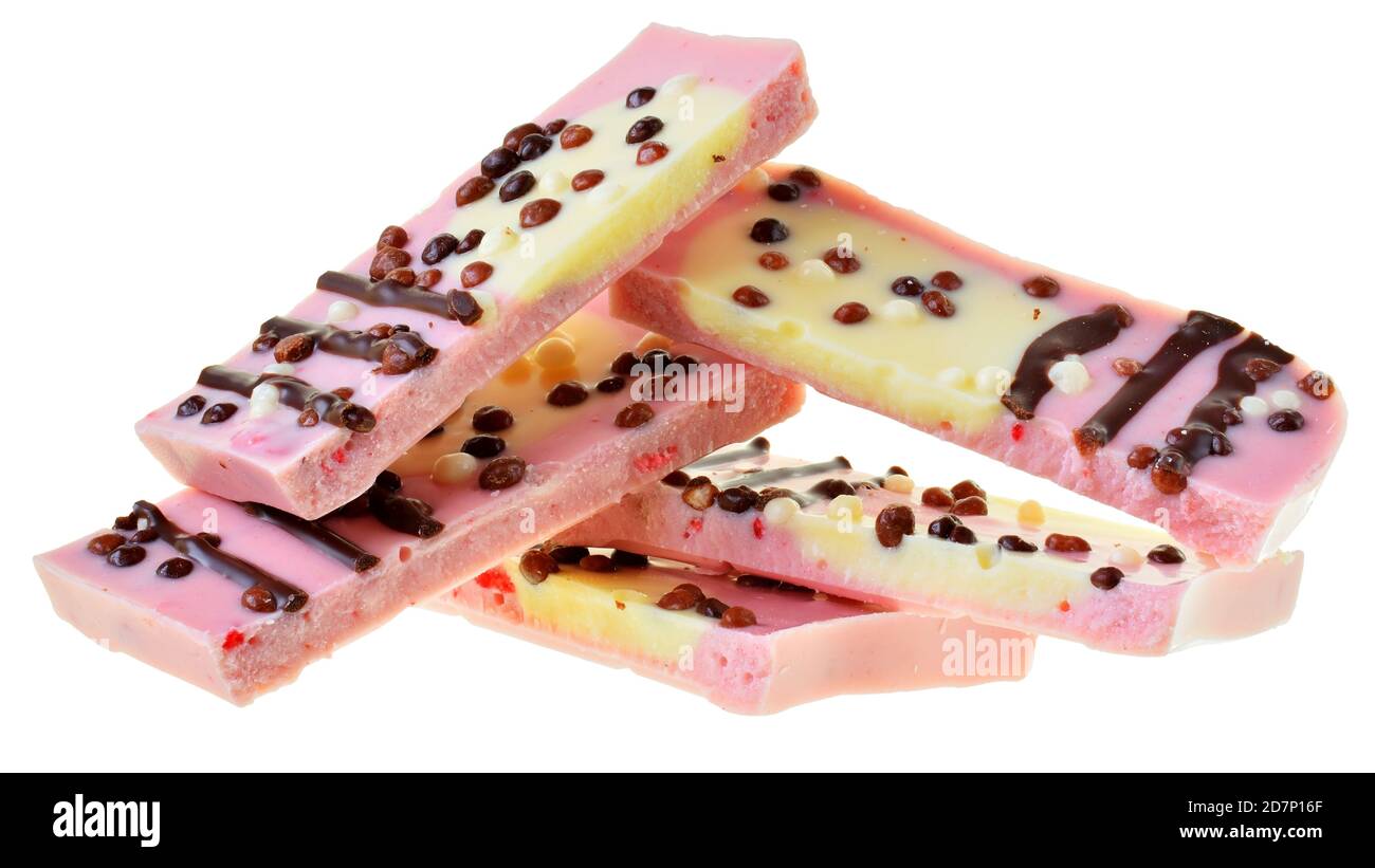 Pink chocolate with strawberries and popped rice isolated on a white ...