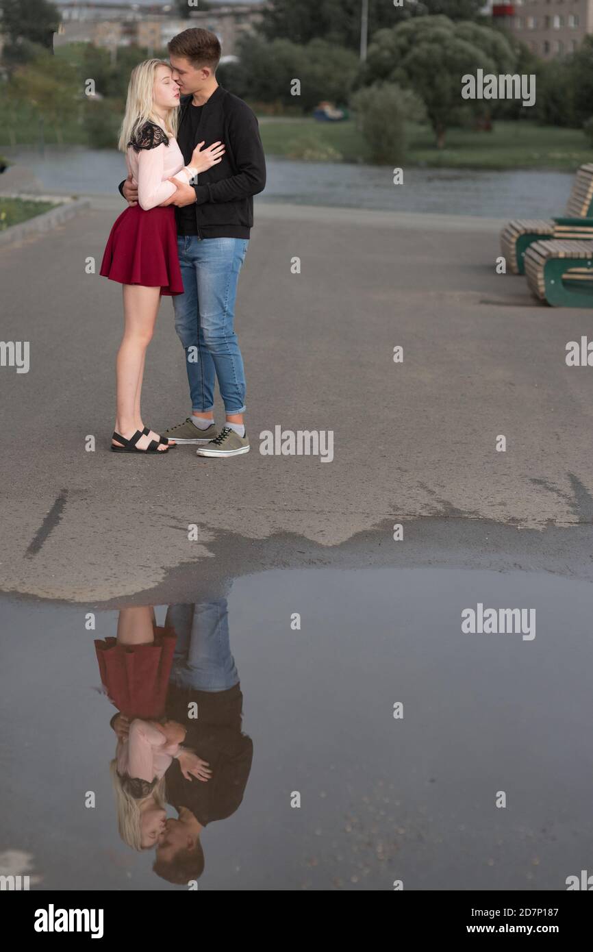 Couple water puddle reflection hi-res stock photography and images - Alamy
