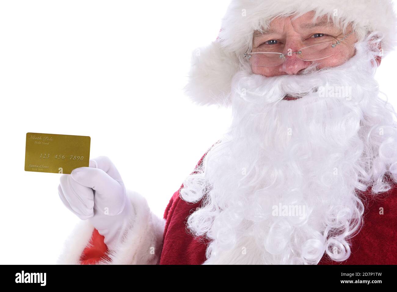 Closeup of Santa Claus holding his personal Noth Pole Gold Credit Card ...