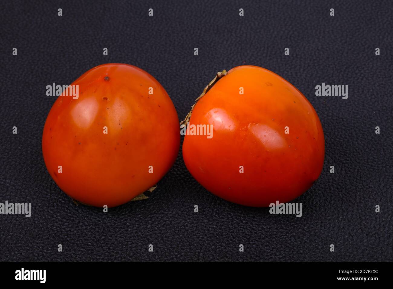 Sweet tasty rioe persimmon fruit Stock Photo - Alamy