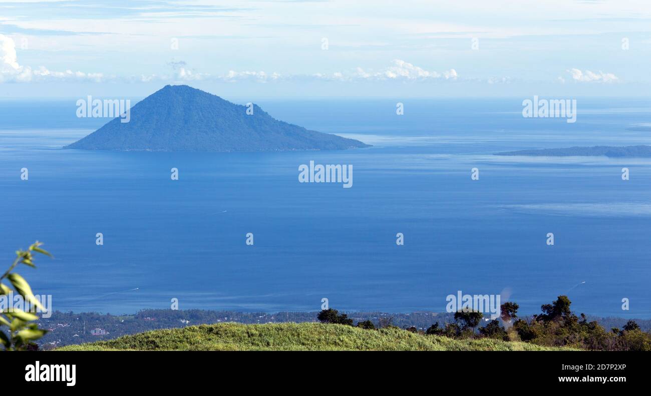 View of island in front of Manado, Indonesia Stock Photo - Alamy