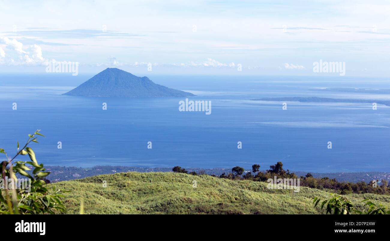 View of island in front of Manado, Indonesia Stock Photo - Alamy