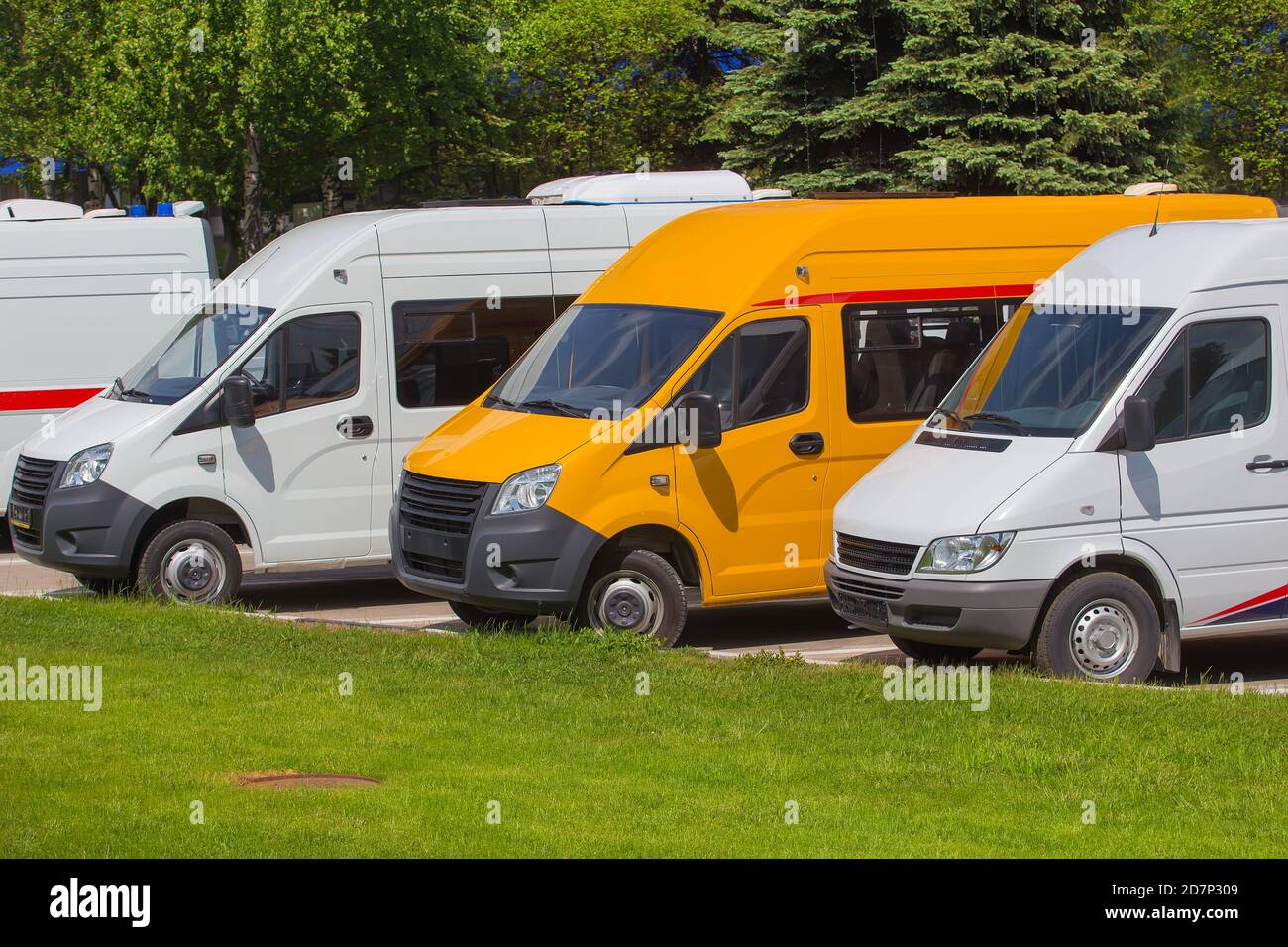 new mini buses in the Parking lot Stock Photo - Alamy