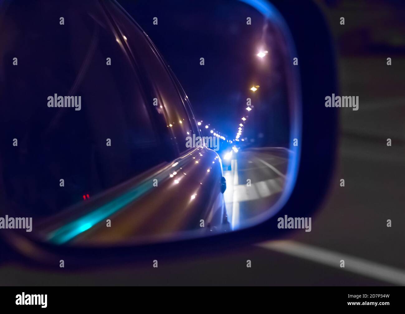 reflection in the mirror the night riding on the road cars Stock Photo ...