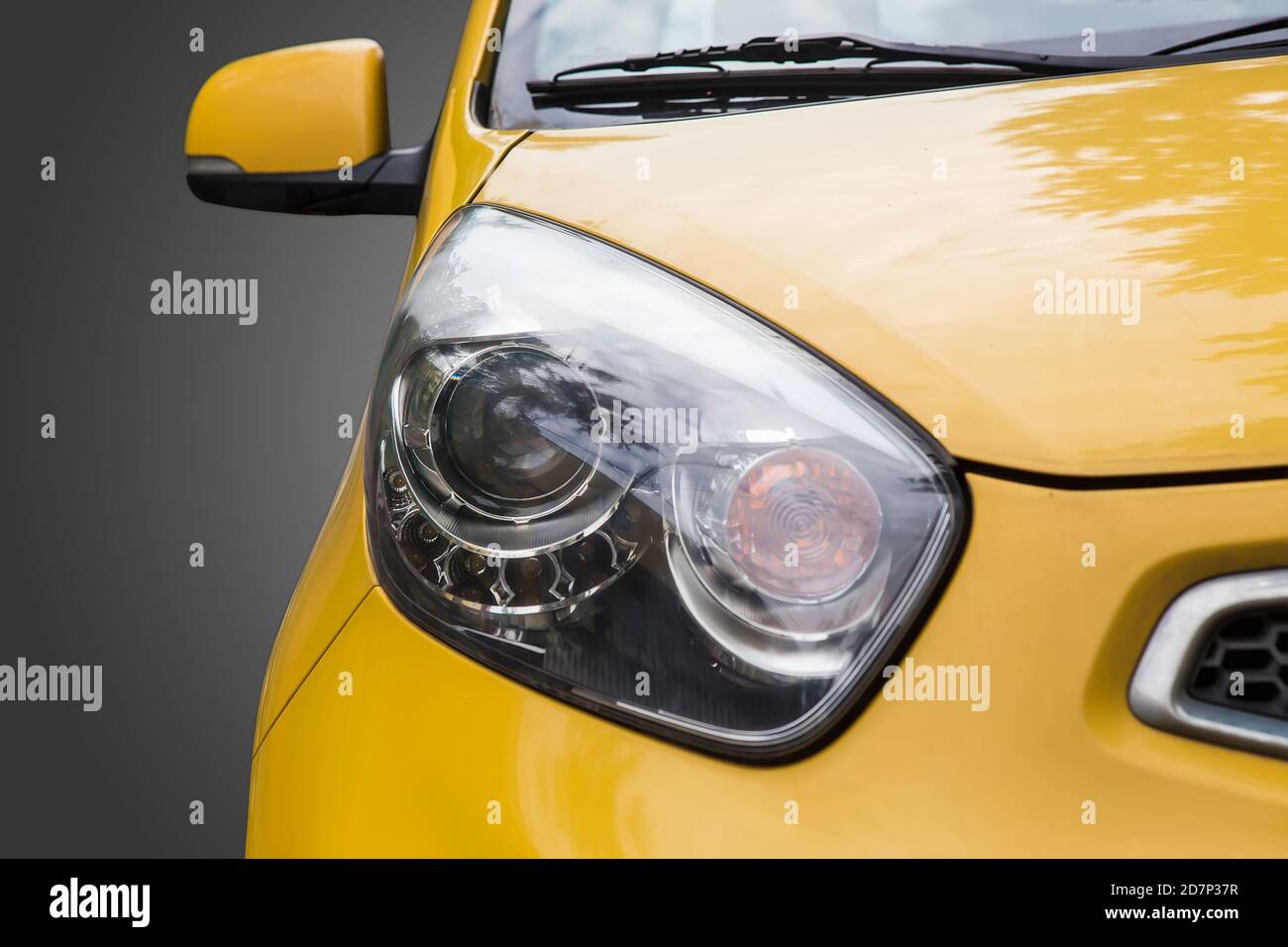 front view yellow car close-up Stock Photo - Alamy