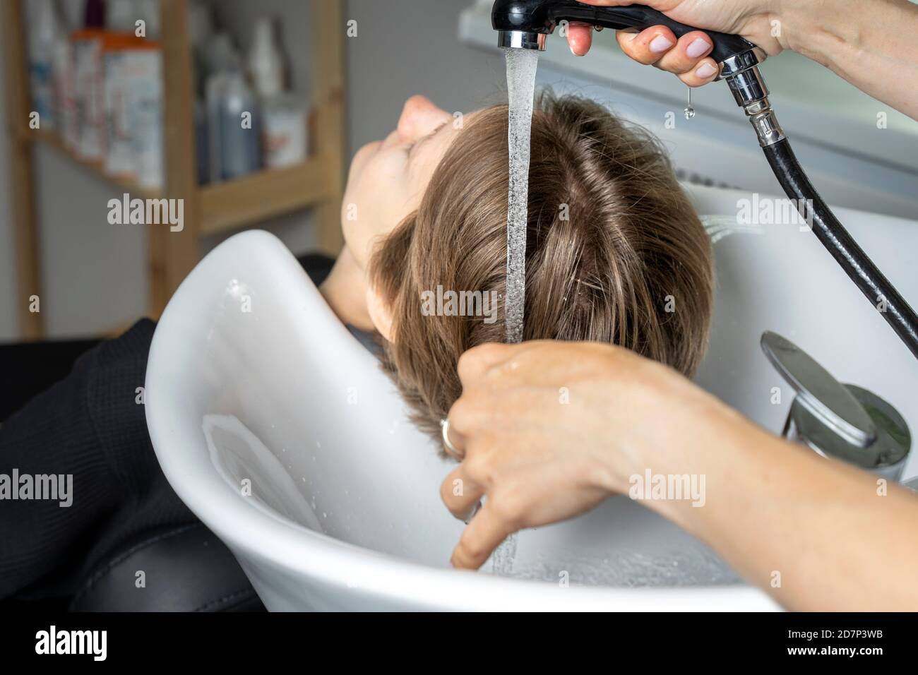 women wash their hair in a beauty salon Stock Photo - Alamy