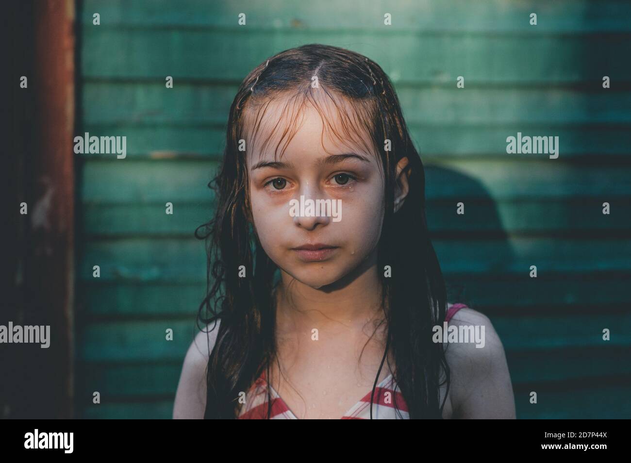 portrait of a beautiful girl on the street. Photos in cold tones ...