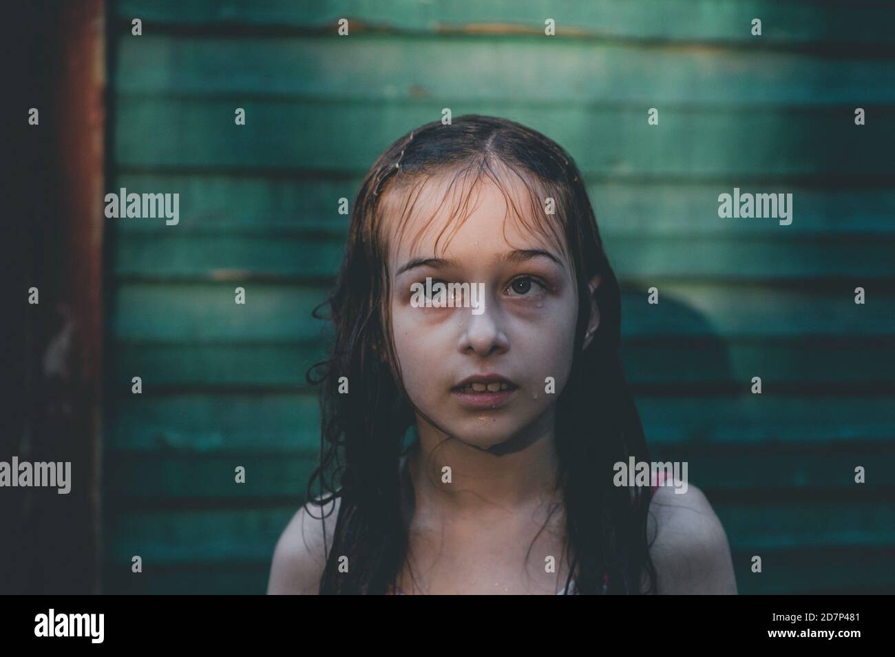 portrait of a beautiful girl on the street. Photos in cold tones ...