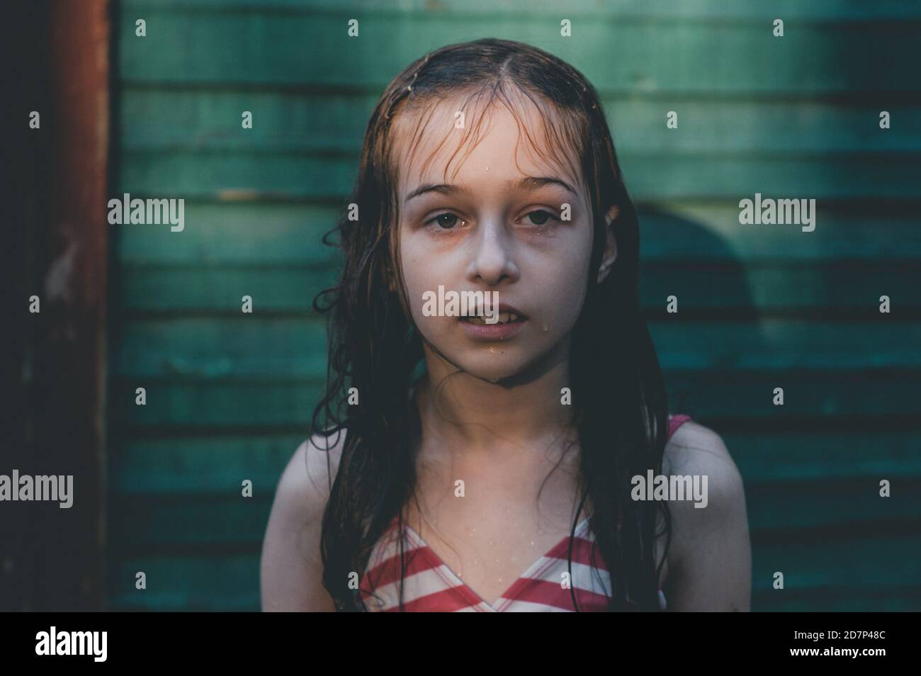 portrait of a beautiful girl on the street. Photos in cold tones ...