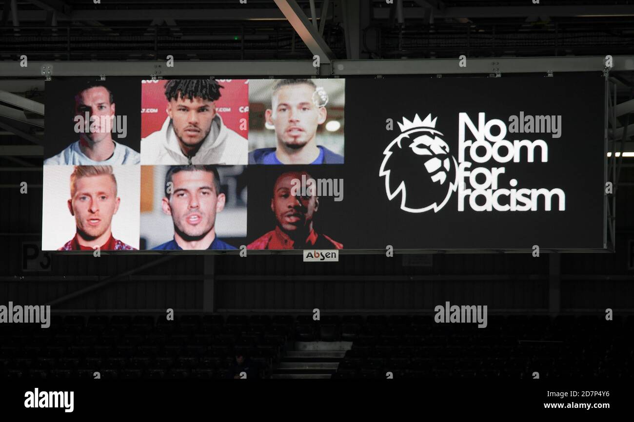 The big screen displays a No Room For Racism video during the Premier ...