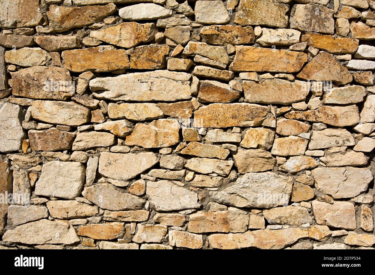 Beautiful wallpaper with old rustic stone wall Stock Photo - Alamy