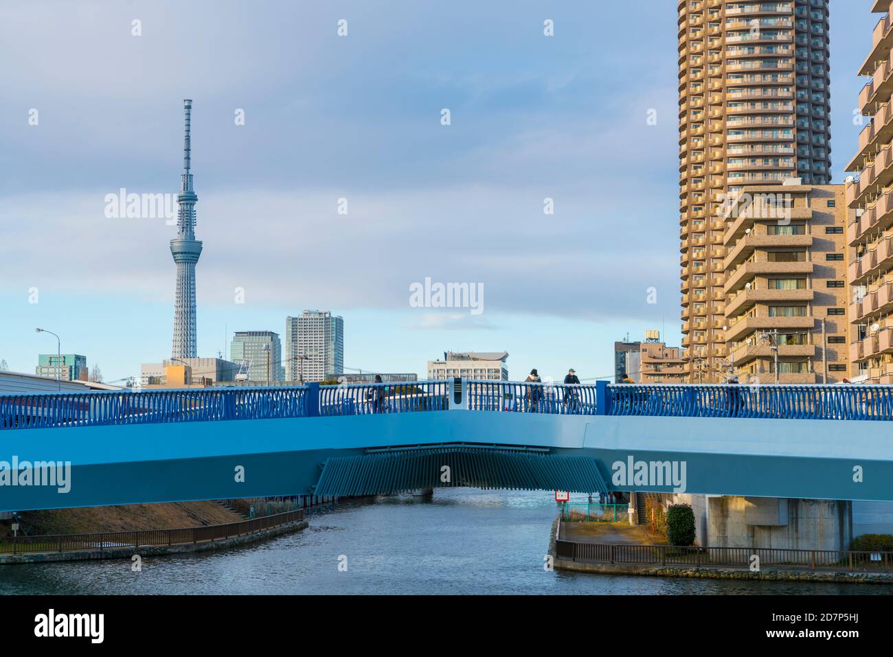 People walk on the Onagigawa Clover Bridge at Koto Ward Tokyo Japan ...
