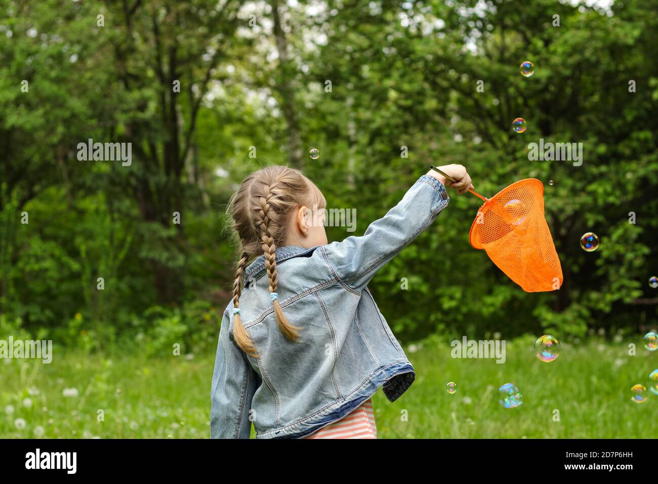 Child catches bubbles hi-res stock photography and images - Alamy