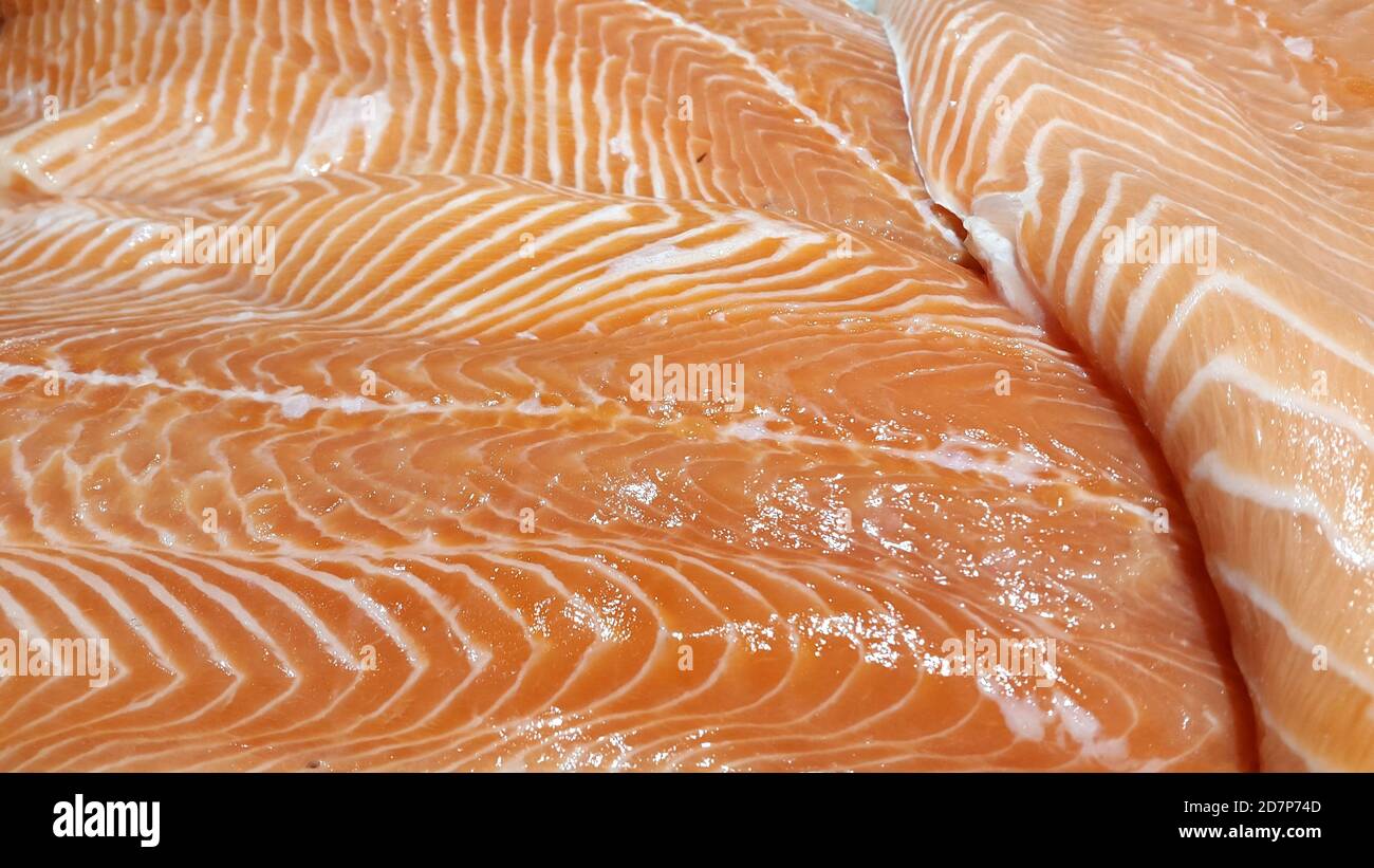 Fish meat. Red fish fillet. Cut up red fish Stock Photo - Alamy