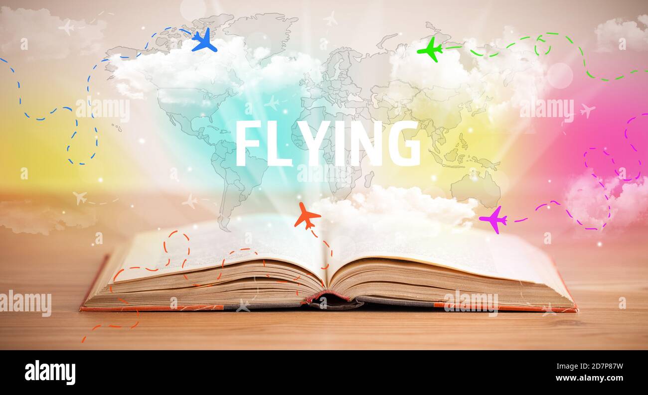 Open book with FLYING inscription, vacation concept Stock Photo - Alamy