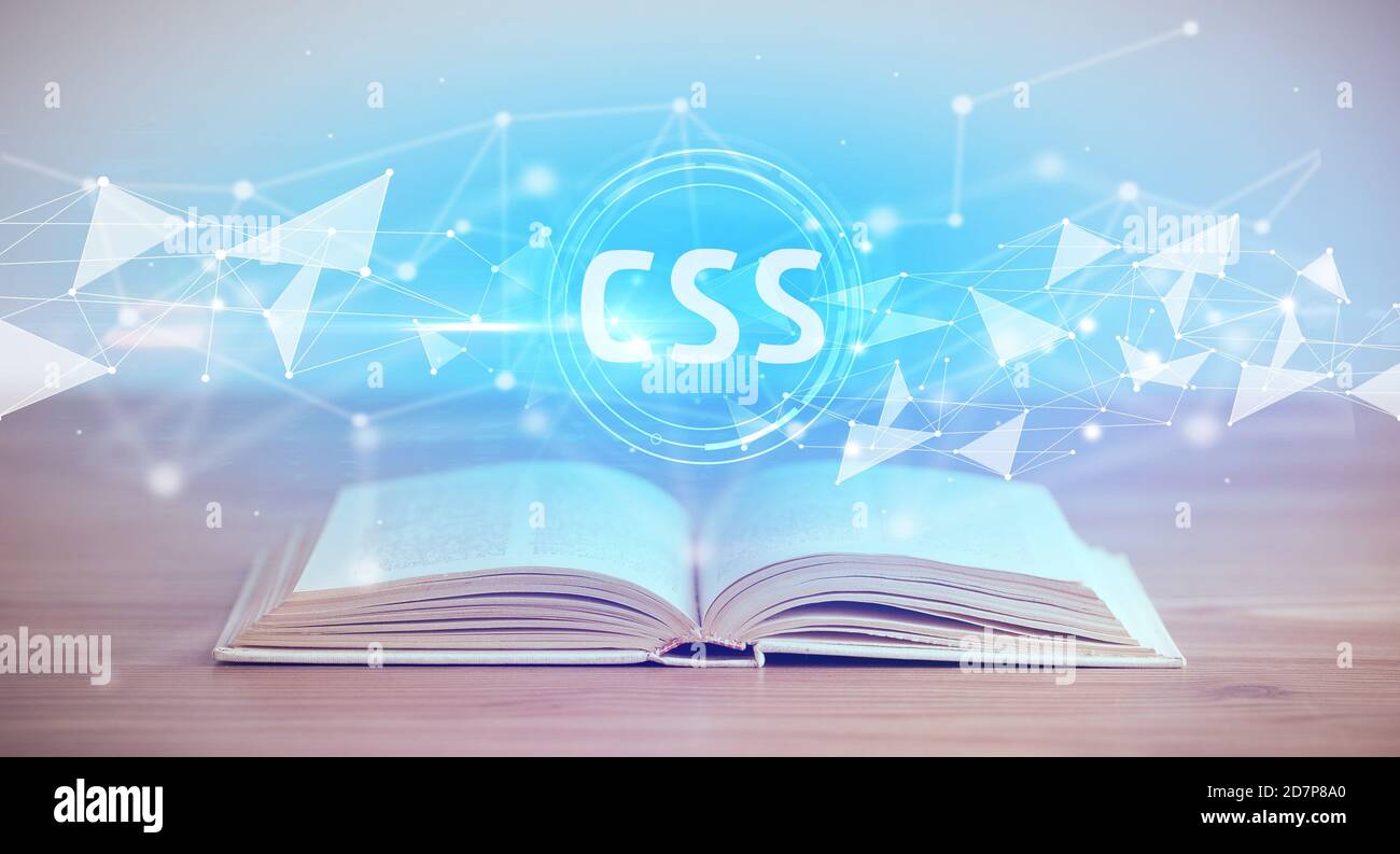 Open book with CSS abbreviation, modern technology concept Stock Photo ...