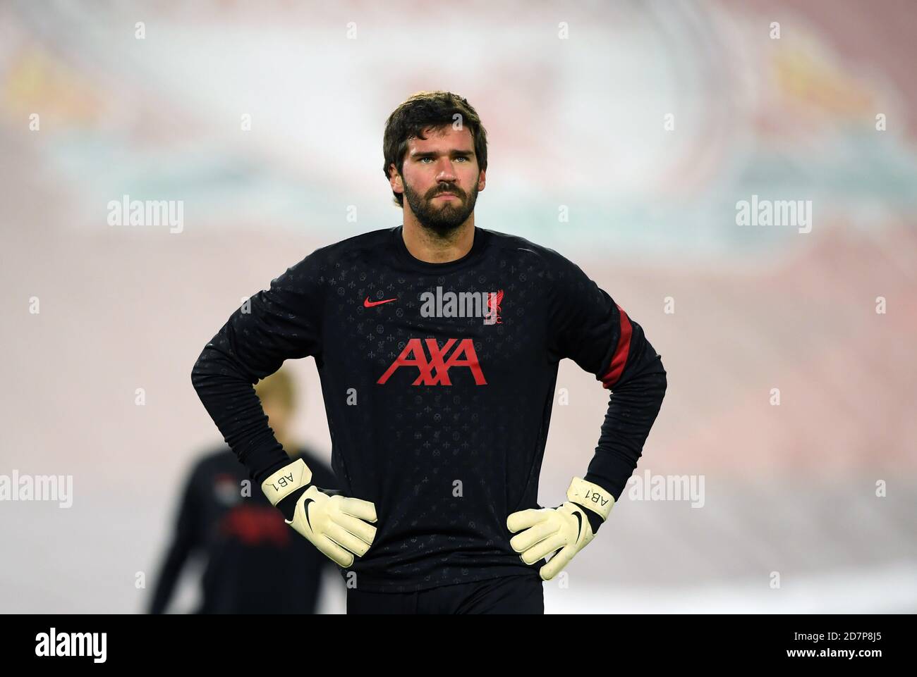 Liverpool goalkeeper Alisson warms up before during the Premier League ...