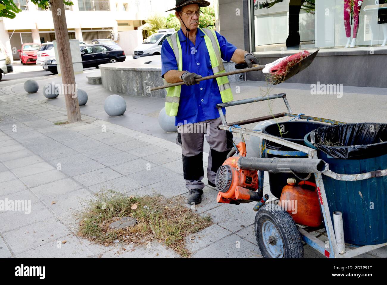 Sweeping and cleaning street and pavement Stock Photo - Alamy