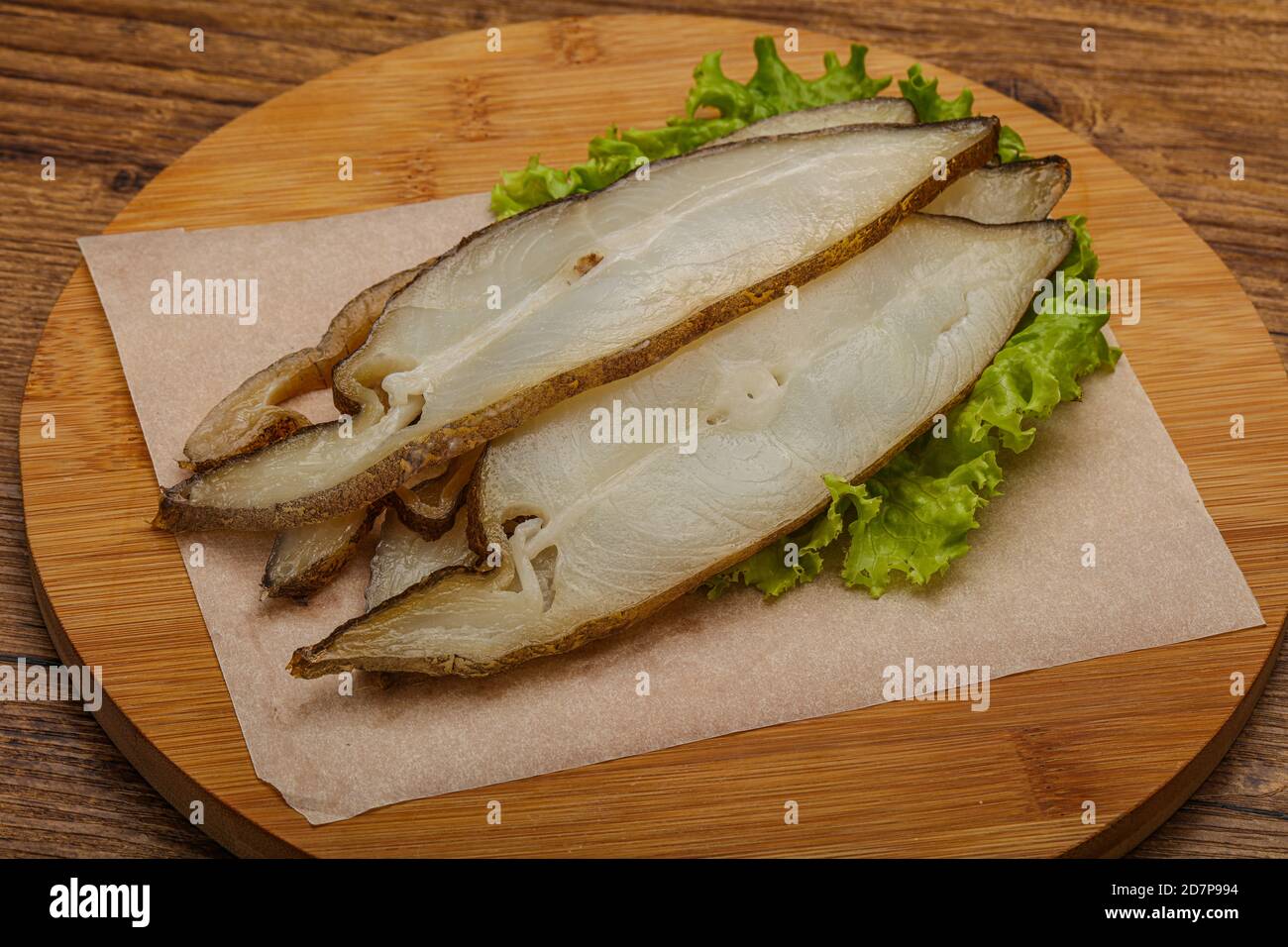 Delicous smoked halibut fish slices snack Stock Photo - Alamy