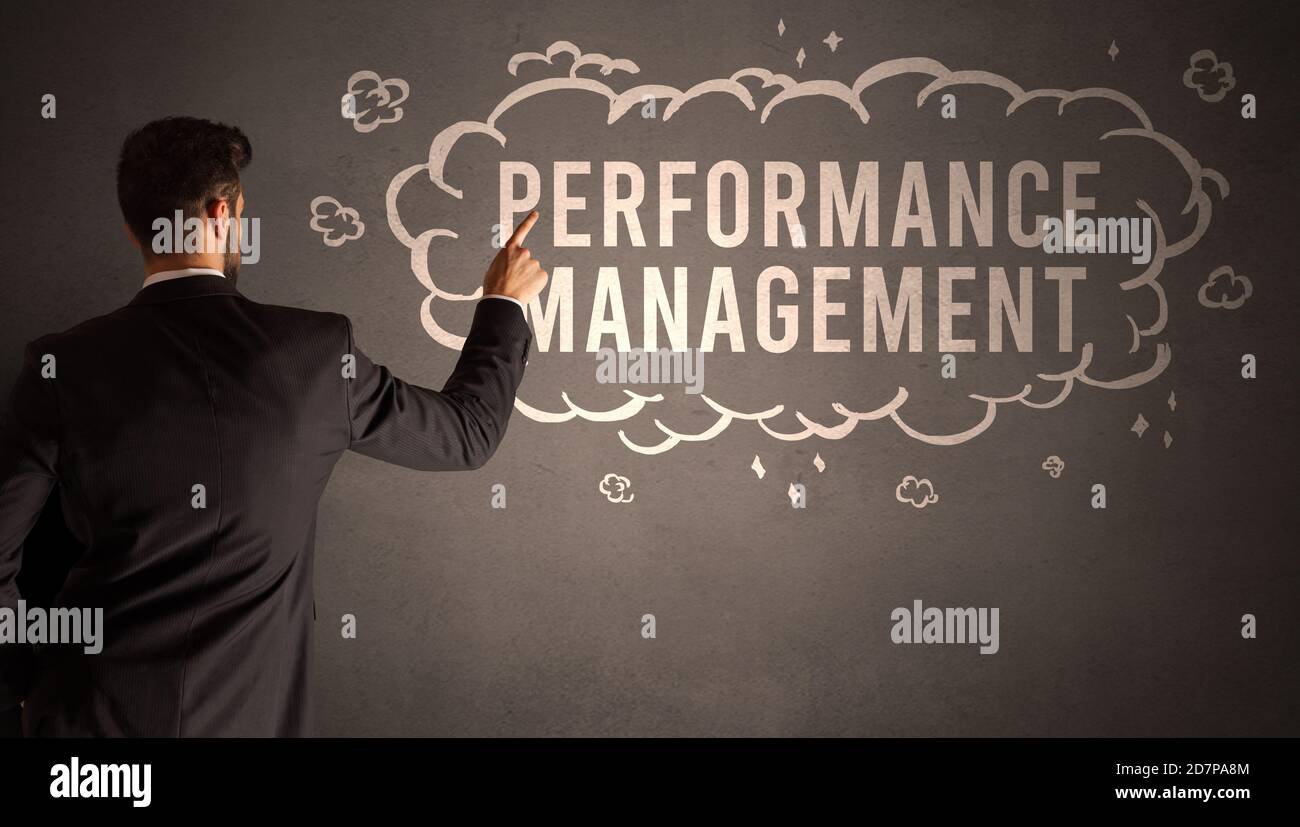 businessman drawing a cloud with PERFORMANCE MANAGEMENT inscription ...