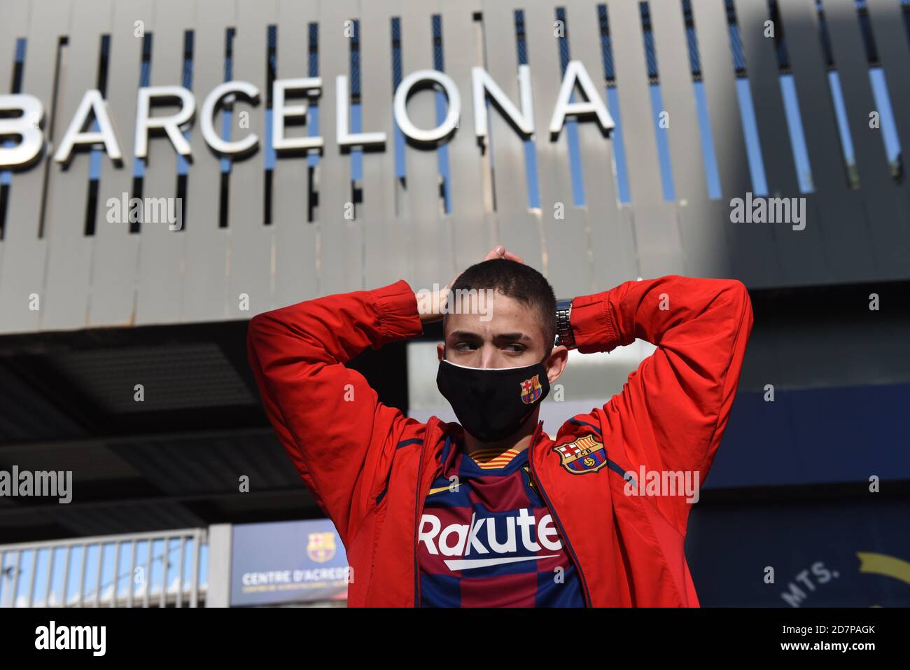 A Barça fan reacts outside Camp Nou stadium during the match.Real ...