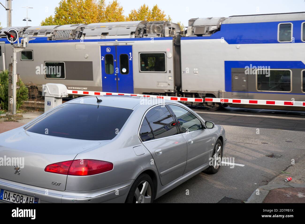 Waiting at level crossing, Vernaison, Rhone, France Stock Photo - Alamy